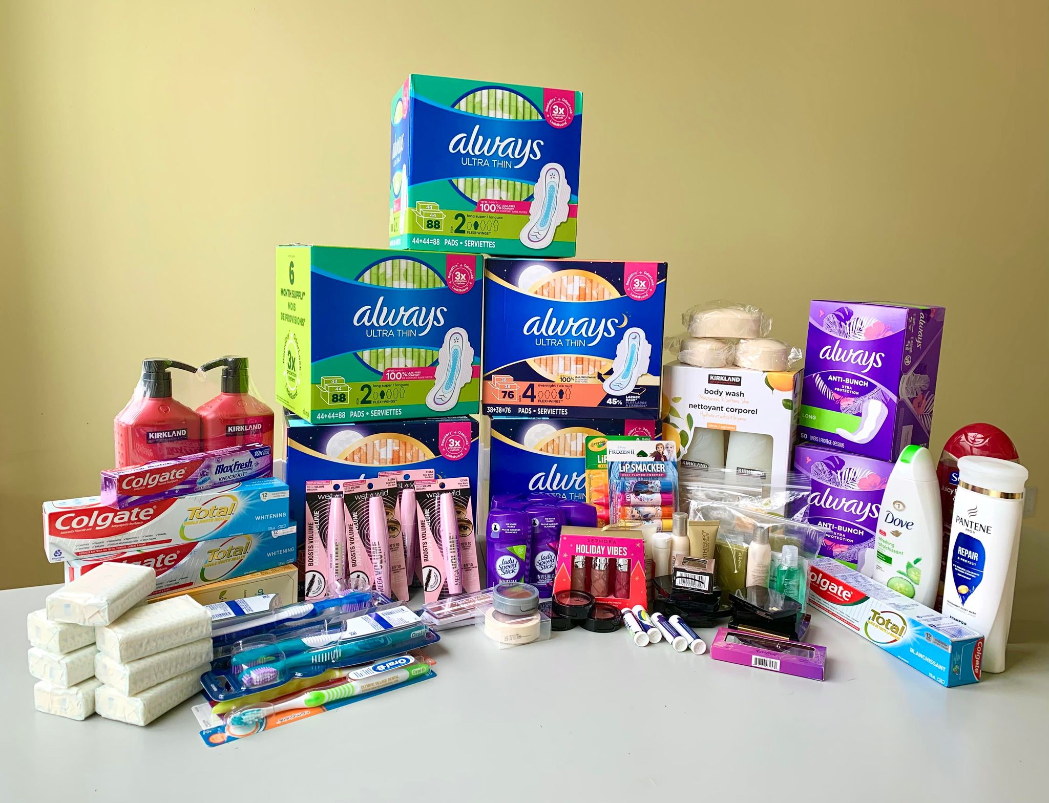 Burnaby woman handing care packages to newly landed Ukrainian women