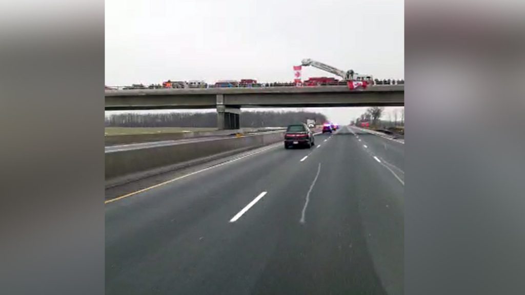 Police officers, public salute procession for slain OPP cop