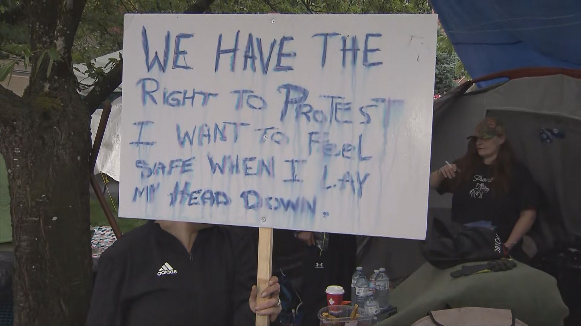 Tent city outside Abbotsford City Hall stands after trespass notice
