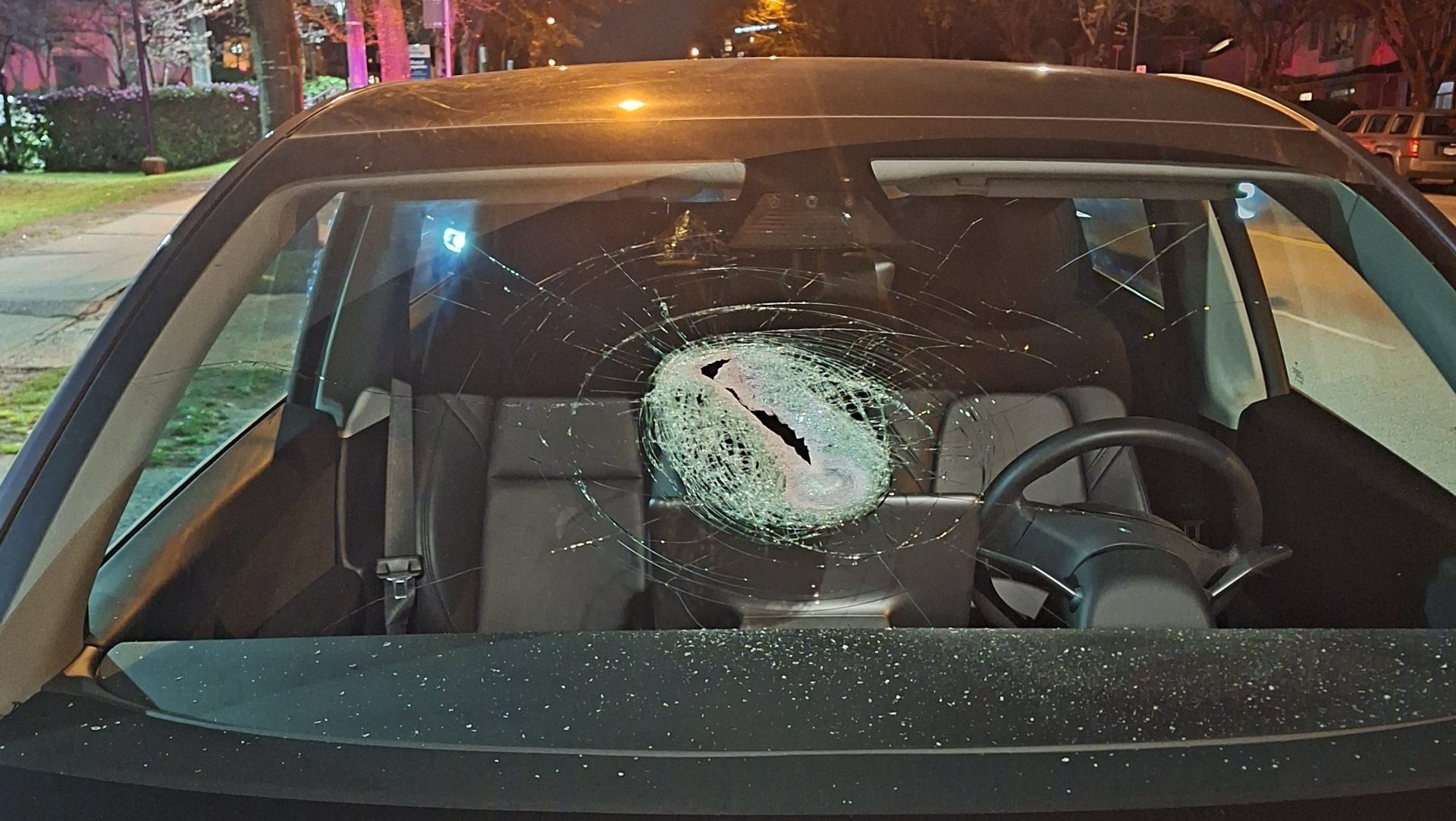 Woman injured after Tesla windshield smashed in Vancouver