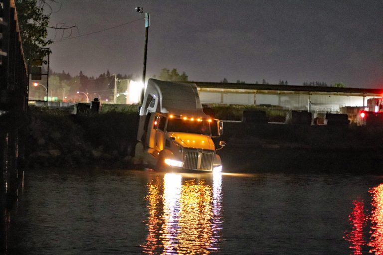 Stolen semi-truck crashes into Fraser River after high-speed chase